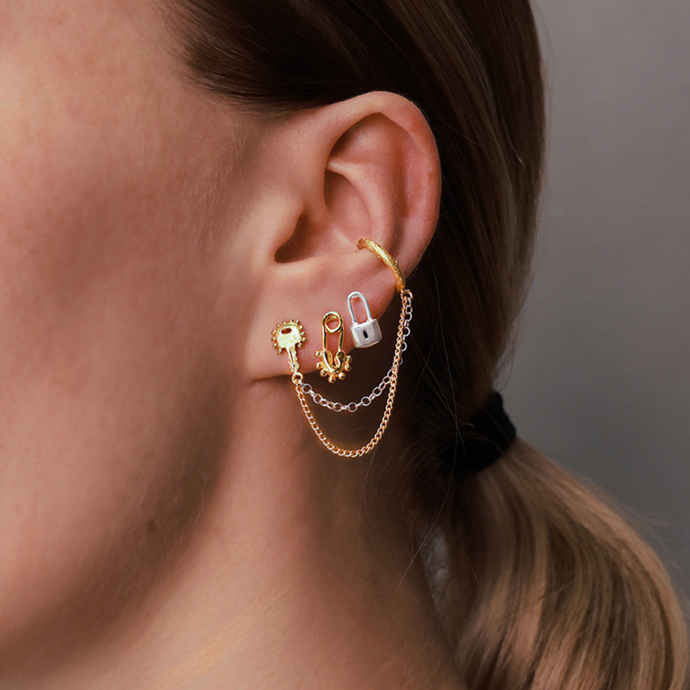 Tiny Lock Silver Studs – Daniela Salcedo